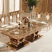 China Custom Golden Stainless Steel Glass Dining Table Luxury Rectangle Furniture for sale