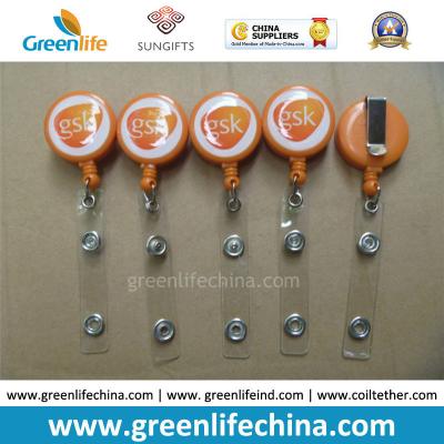 China Custom Logo Printing Epoxy Dome Round Orange Retractable Key Holder for sale