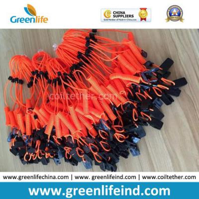 China Small Orange Retractable Short Spring Coil W/Plastic Black Clip for sale
