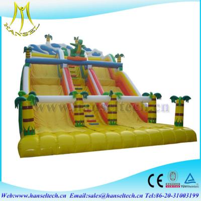 China Hansel attractive kids amusement park games inflatable climbing wall with slide for sale