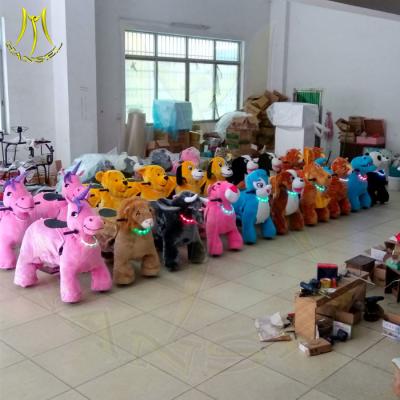 China Hansel coin operated horse ride motorized riding toys rohs standard luck cow electric motorized scooter with rich toys for sale