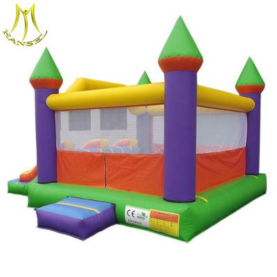 China Hansel stock largest inflatable bouncer castle with slide in amusement park in China for sale