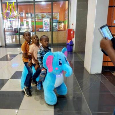 China Hansel kids ride on walking coin operated motorized plush riding animals for sale