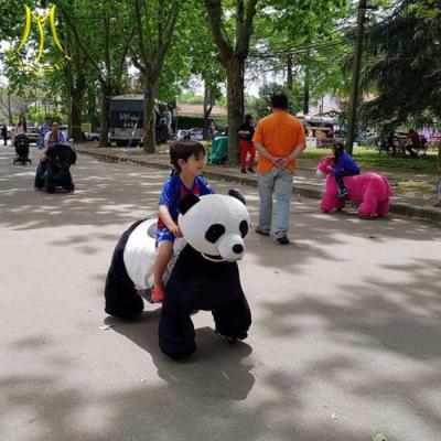 China Hansel funny amusement park games plush walking animal rocking horse with wheels for sale