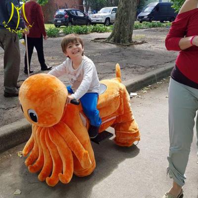 China Hansel coin operateted game machine falgas kiddy ride stuffed animal unicorn on wheels for shopping for sale