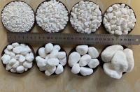 China 30mm Natural River Stone Pebbles for sale