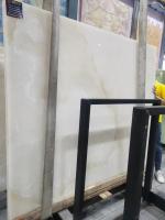 China Natural White Jade Luxury Stone Tiles Honed For Tv Background Wall Decoration for sale