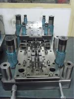 China Two Row Cavity Stamped Sheet Metal Parts, Progressive Stamping Process 2mm Thickness for sale