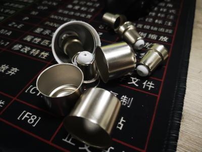 China Precision Deep-Drawn Metal Shells with Ceramic Insulators | Custom Nickel-Plated Stainless Steel Housings for Electronic Sensors, RF Connectors, and High-Voltage Devices for sale