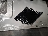 China Custom Black Powder-Coated Stamped Mounting Brackets | Multi-Hole Sheet Metal Support Plates | Precision Bending Steel Fixing Parts for Industrial and Electrical Assemblies for sale