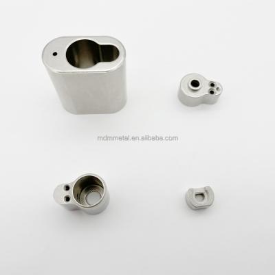China Metal Injection Molding Lock Core Case 304L Stainless Steel 50000 Pcs Monthly Capacity for sale