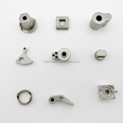 China Precision Sintered Metal MIM Lock Parts Metal Bushing ODM 50000 pcs Monthly Capacity for sale