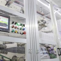 China Sanitary Pad Making Machine 1200pcs/min 240V with Customized Size Options for sale