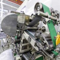 China High Speed Sanitary Napkin Manufacturing Machine 1200PCS/Min 240V 50Hz for sale