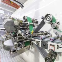 China CE Sanitary Napkin Production Line 1200pcs/min PLC Servo Drive 240V for sale