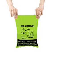 China Flat Top Biodegradable Dog Poop Bags With Handles Dispenser Box Packed Rolled for sale