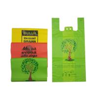 China Blocked Biodegradable T Shirt Bags Packaging Compostable Grocery Bags With Handles for sale