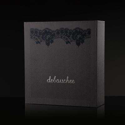 China Custom Rigid Cardboard Three Bottle Gift Box Packaging Black Soft Touch Silver Letters EVA Insert for sale