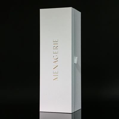 China Luxury Rectangular White Textured Magnetic Rigid Box Embossing Stamping Packaging with Insert for Premium Products for sale