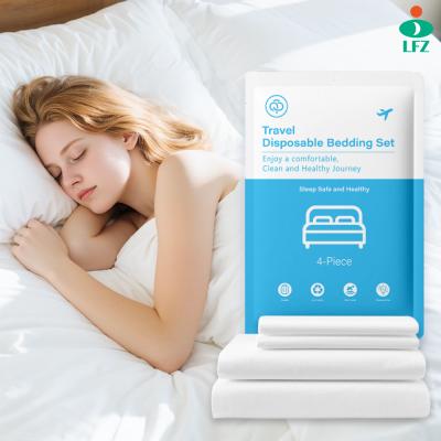 China Hygienic 4-piece Disposable Bedding Sheets Set Quilt Cover Pillowcase for Hotel Travel for sale