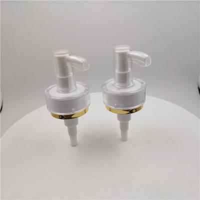 China Cosmetic 33/410 1.5cc Shampoo Dispenser Pump With Gold Around Edge for sale