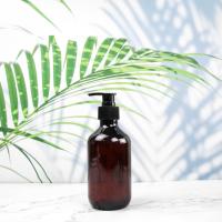 China Manufacturer Wholesale Brown Gray 300ml Transparent Empty PET Plastic Shampoo Bottle With Pump Cap for sale