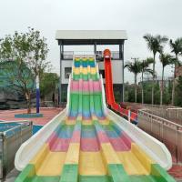 China Rainbow Water Slide 8m Height 65m Length Fiberglass Pool Slide for Amusement Parks with 500kg Capacity for sale