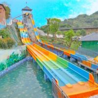 China 0.65m Inner Width Rainbow Water Slide with 65m Length and 180 Guests/Hour Capacity for Theme Parks for sale