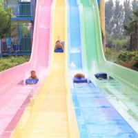 China Custom Fiberglass Water Slide Equipment 8m Height 65m Length with 500kg Capacity for Adventure Parks for sale