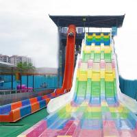 China Custom Rainbow Water Park Slide 65m Length 180 Guests/Hr Capacity Fiberglass Construction for Amusement Parks for sale