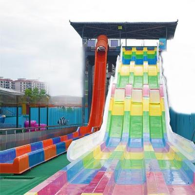 China Custom Rainbow Water Park Slide 65m Length 180 Guests/Hr Capacity Fiberglass Construction for Amusement Parks for sale
