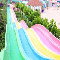 China Rainbow Water Slide 8m Height 65m Length Fiberglass Aquatic Slide for Amusement Parks with 500kg Capacity for sale