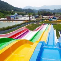 China Multi-Lane Rainbow Wavy Water Slide 65m Length × 3 Lanes with 180 Guests/Hour Capacity for Amusement Parks for sale