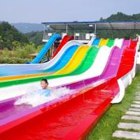China Multi-Lane Rainbow Wavy Water Slide 65m Length × 3 Lanes with 180 Guests/Hour Capacity for Amusement Parks for sale
