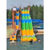 China Customized Rainbow Water Slide Aqua Park Equipment 8m Height 42m Length Anti-UV Fiberglass Construction for sale