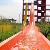 China Custom High-Speed Water Slide 8m Height 65m Length with UV Resistance for Amusement Parks for sale