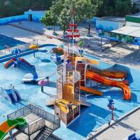 China Fantasy Water Park Pirate Ship Playground 18m x 16m with 7 Water Slides 11KW Power Weatherproof Design for sale