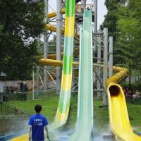 China Custom Fiberglass Speed Water Slide 8m Height 65m Length with 180 Guests/Hour Capacity for Amusement Parks for sale