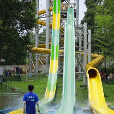 China Custom Fiberglass Speed Water Slide 8m Height 65m Length with 180 Guests/Hour Capacity for Amusement Parks for sale