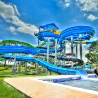 China Water Theme Park Equipment Fiberglass Adult Slide Water Roller Coaster for sale