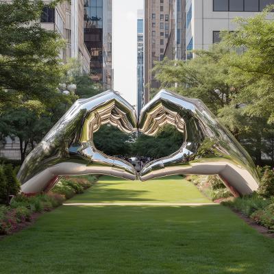 China Custom Stainless Steel Love Heart Hand Sculpture 350CM Mirror Polish for Park for sale