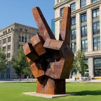 China Custom Corten Steel Punching Fist Sculpture 260CM H Outdoor Weathering Steel Art for sale