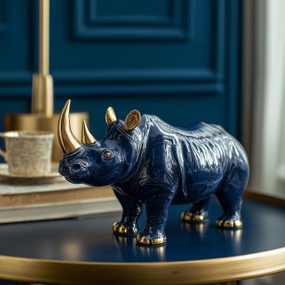 China Custom Resin Rhino Sculpture 40cm Indoor Decorative Ornament for Hotel Lobby for sale