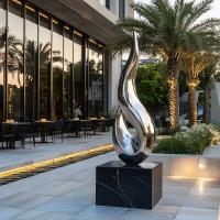China Mirror Polished Abstract Hotel Sculpture 220CM H Stainless Steel Modern Courtyard Art Decor for sale