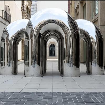 China Highly Reflective Mirror Polished Arch Sculpture for Modern Landscapes for sale