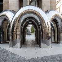 China Highly Reflective Mirror Polished Arch Sculpture for Modern Landscapes for sale