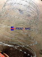 China 1000mm High Tensile Concertina Barbed Wire 15m 68 Coils with 1235 N/m² Strength for sale