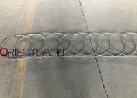 China High Tensile Flat Wrap Razor Wire BTO-11 BTO-22 500mm Coil 15m Length for sale