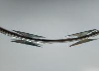 China High Strength Spiral Razor Wire Tape CBT 65 Concertina Barbed Wire Fencing 500mm Coil for sale