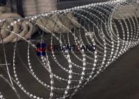 China Stainless Steel Concertina Coil Fencing Security Barbed Wire 56 Loops 450mm for sale